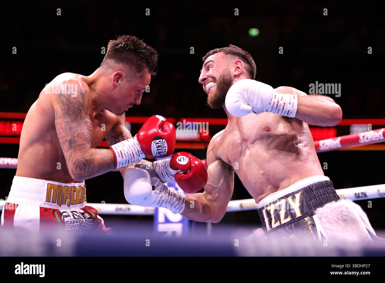 Nathaniel Collins (right) in action against Lee McGregor in the WBC ...