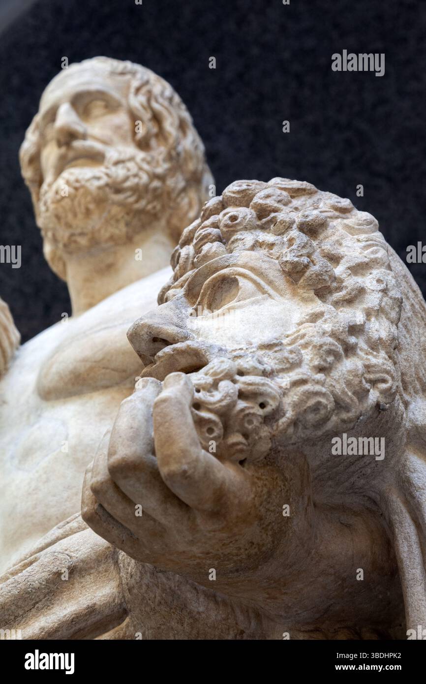 Marble statue of ancient Greek tragic poet Euripides holding a ...