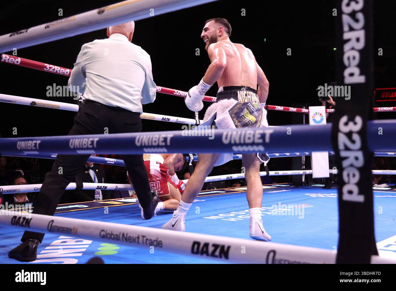 Nathaniel Collins (right) in action against Lee McGregor in the WBC ...
