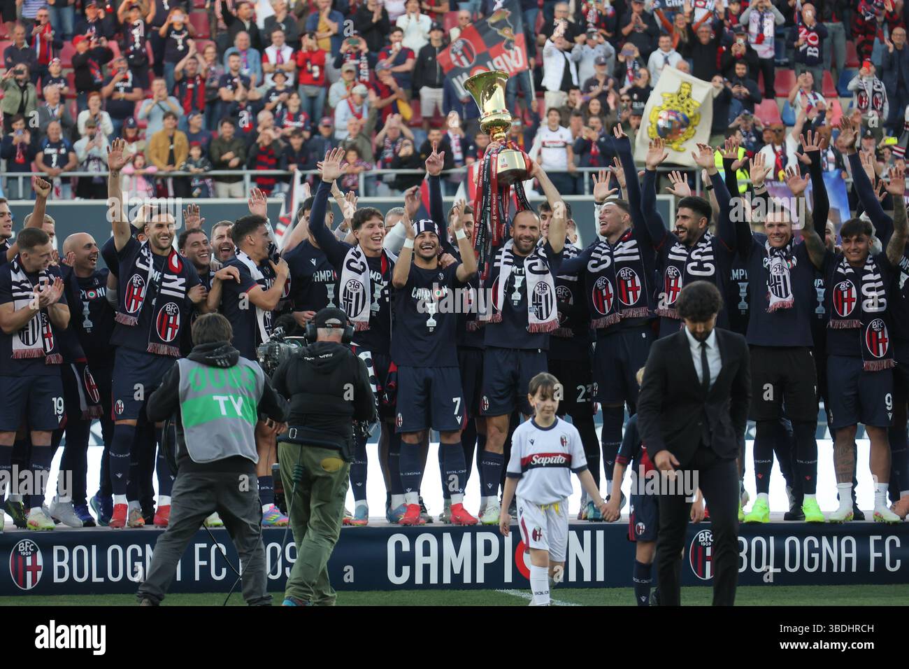 the bologna team celebrates with the italian cup won last week at th ...