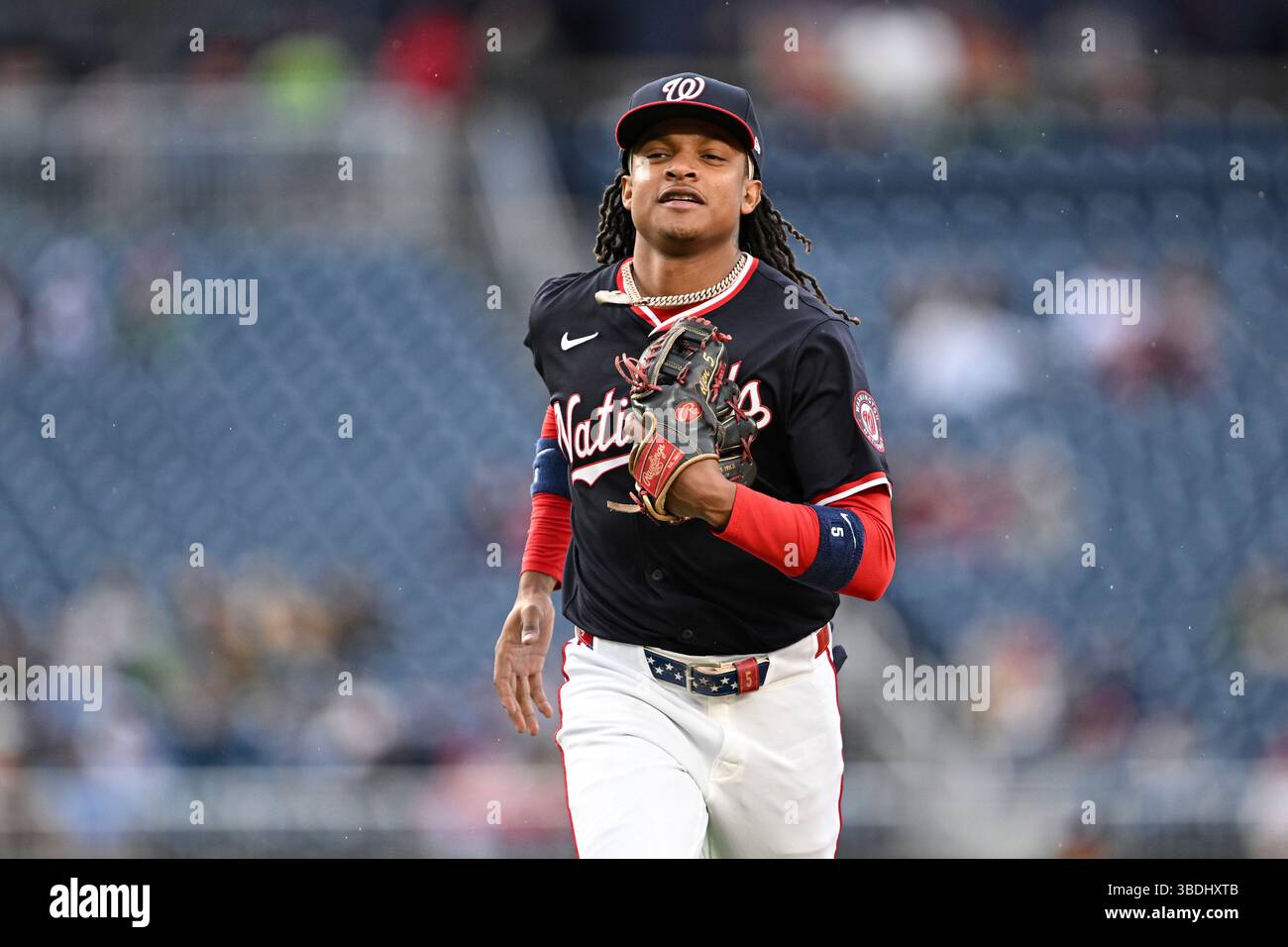 Washington Nationals shortstop CJ Abrams jogs off the field during the ...