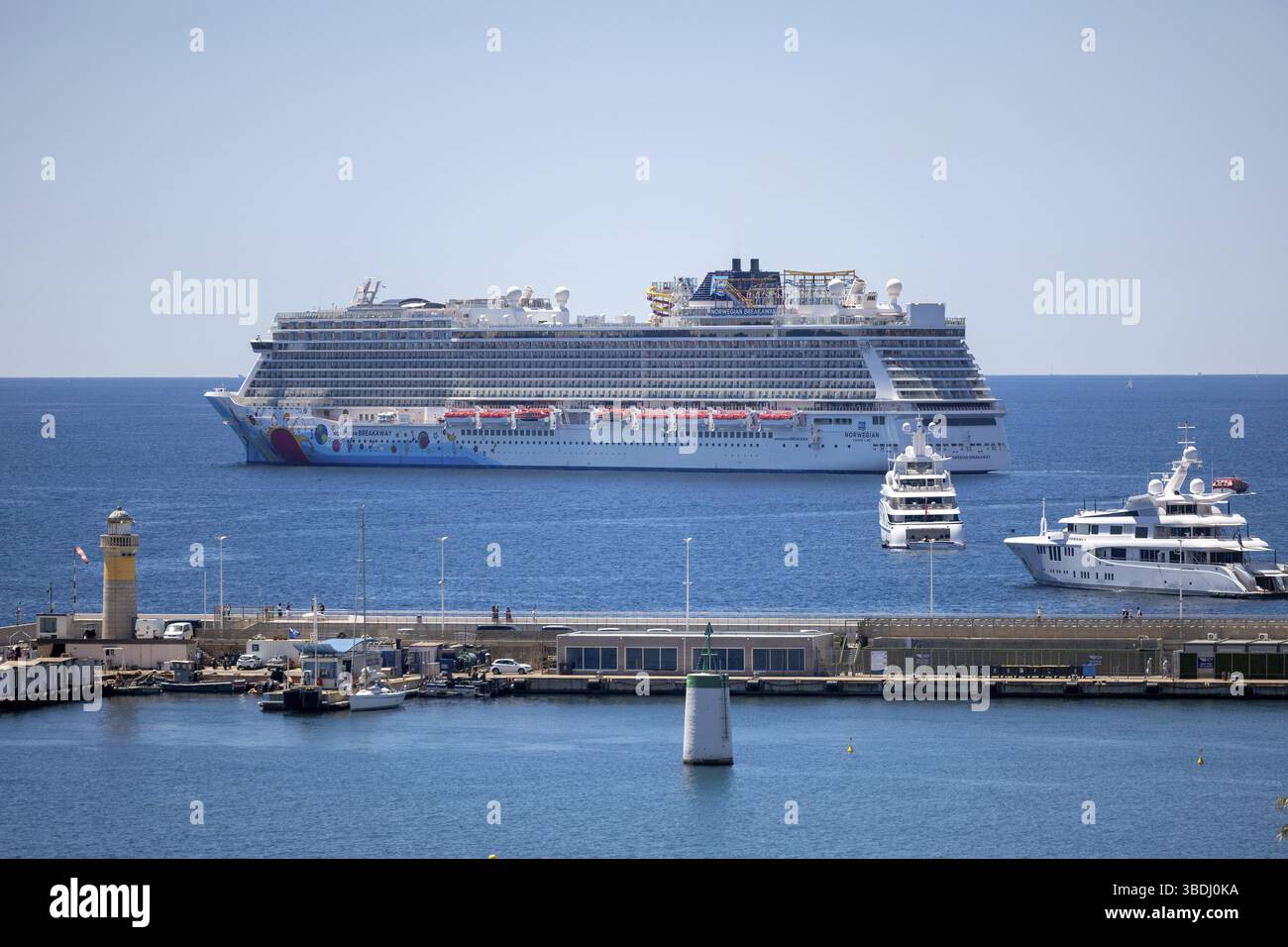 Cannes, France - 23 May 2024: A cruise ship anchors in front of the ...