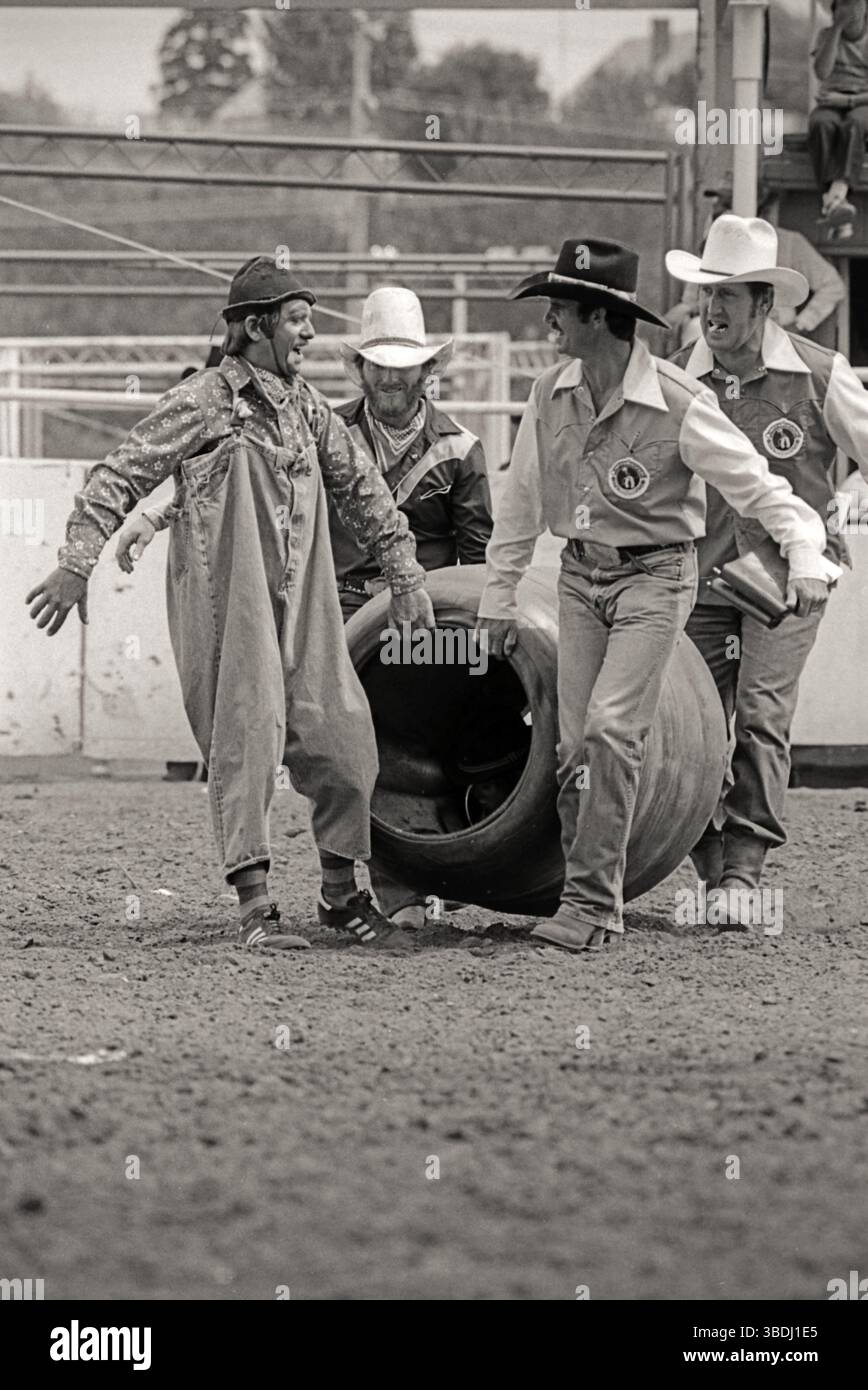 Cowboy infield staff helps a rodeo clown with his barrel Vintage ...