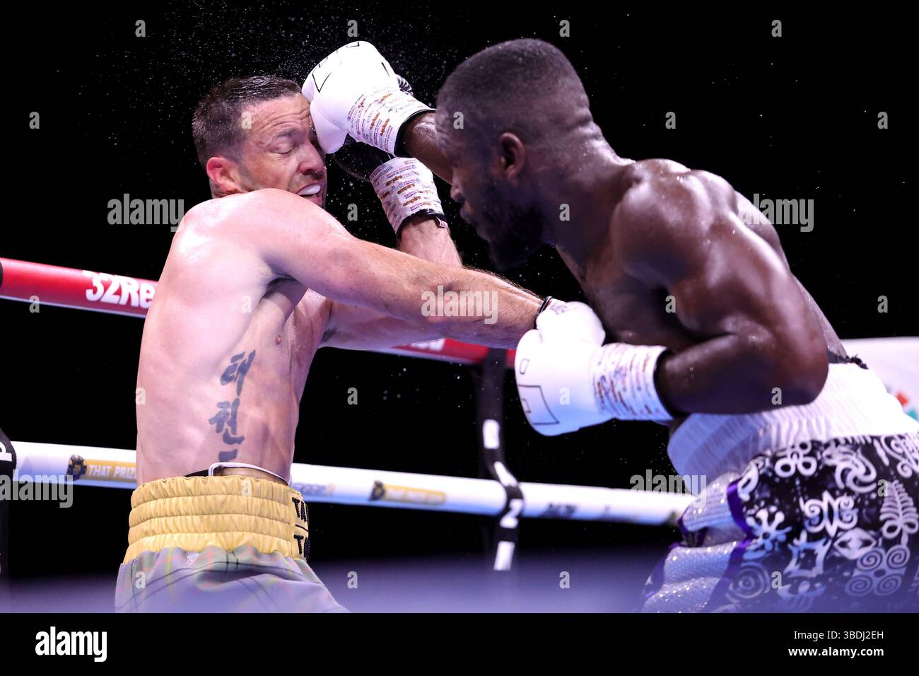 Ekow Essuman (right) in action against Josh Taylor in the WBO Global ...