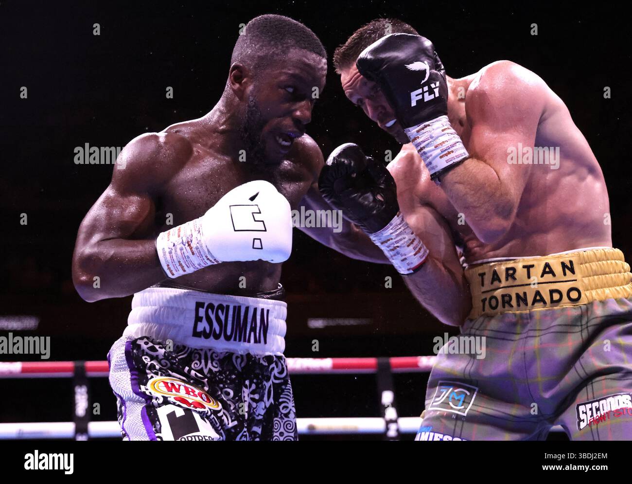 Ekow Essuman (left) in action against Josh Taylor in the WBO Global ...