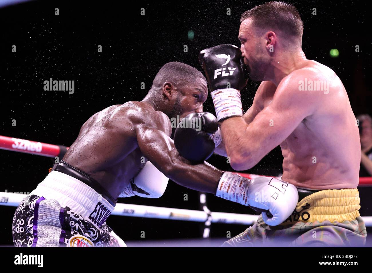 Ekow Essuman (left) in action against Josh Taylor in the WBO Global Welterweight bout at the OVO ...