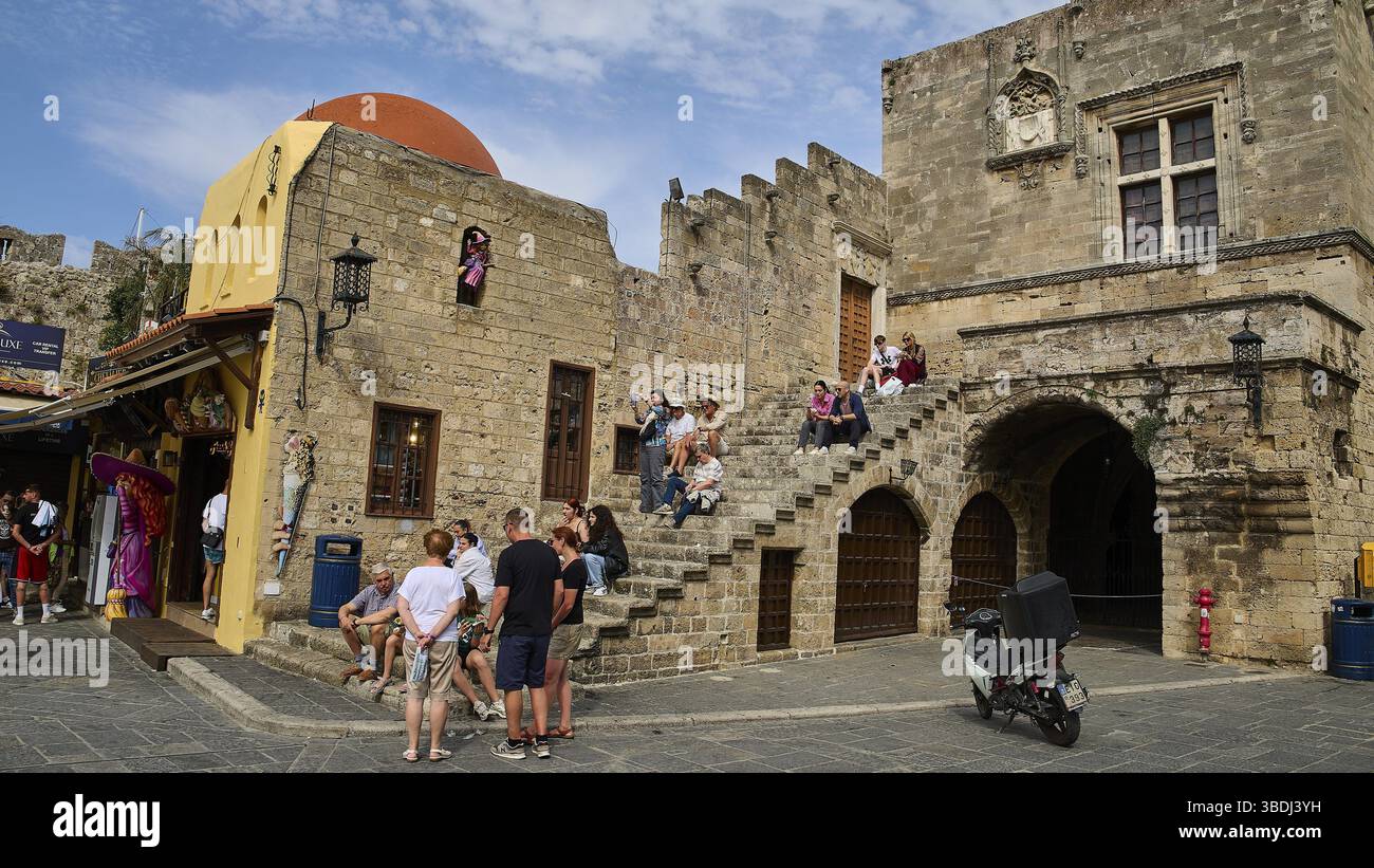 Hippocrates Square, Old Town with stairs and tourists, characterised by ...