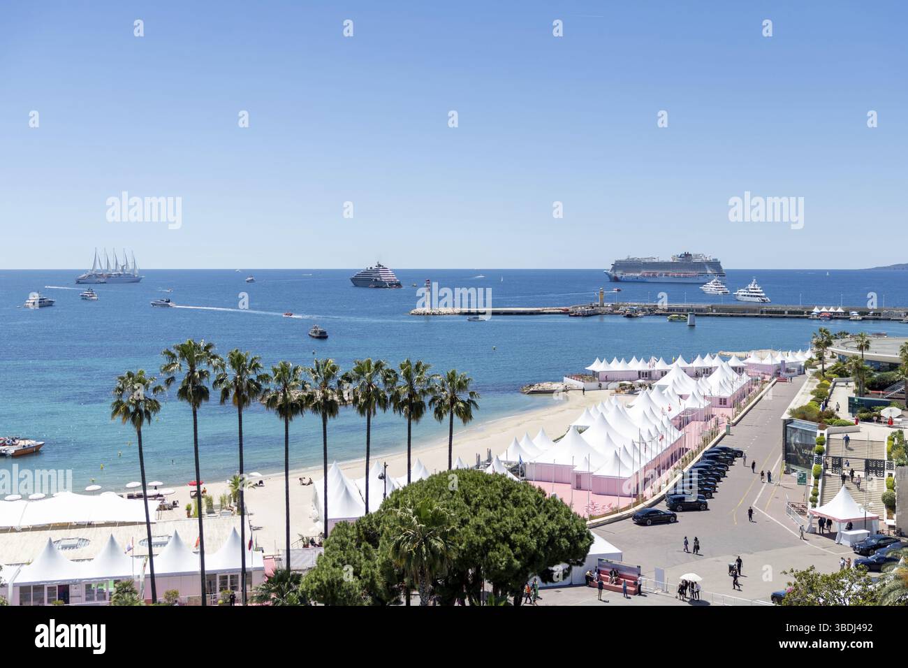 Cannes, France - 23 May 2024: A cruise ship anchors in front of the ...