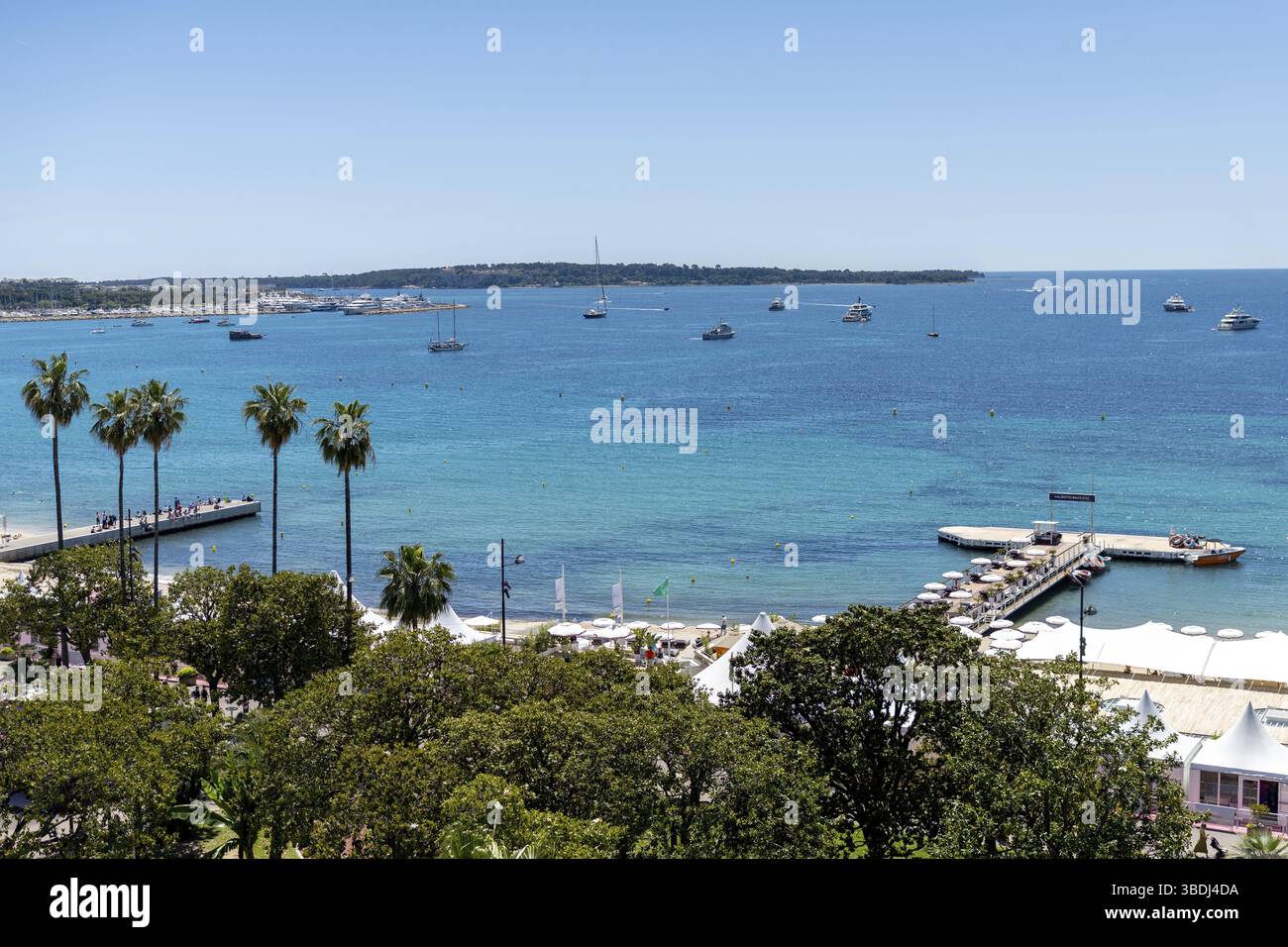 Cannes, France - 23 May 2024: A cruise ship anchors in front of the ...