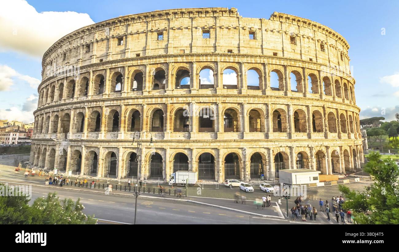 Sunset traffic and tourists moving in front of Colosseum, Colosseo ...