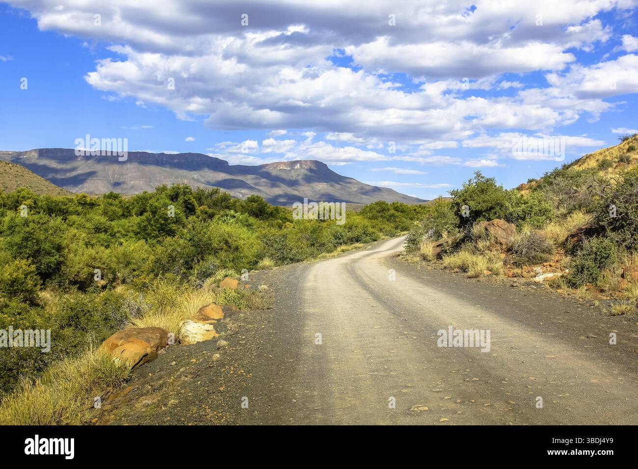 Dirt road in cloudy sky, Karoo National Park in the summer, Western ...