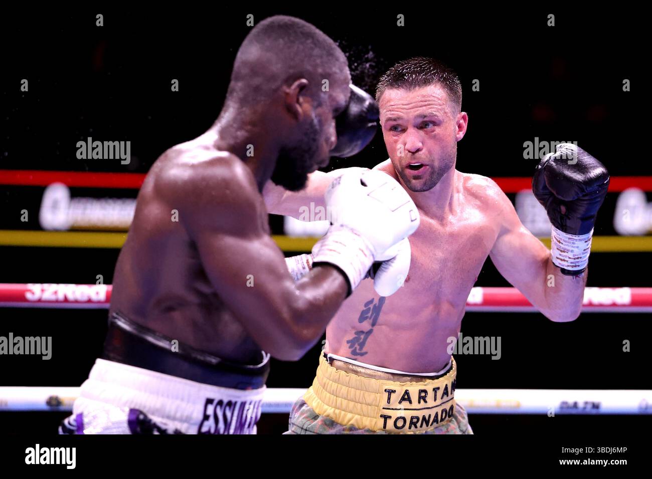 Josh Taylor (right) in action against Ekow Essuman in the WBO Global Welterweight bout at the ...