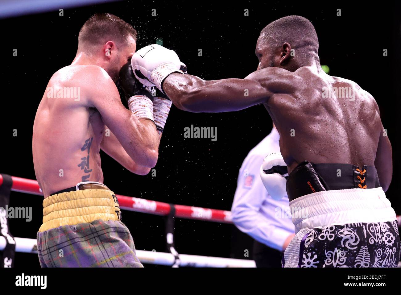 Ekow Essuman (right) in action against Josh Taylor in the WBO Global ...