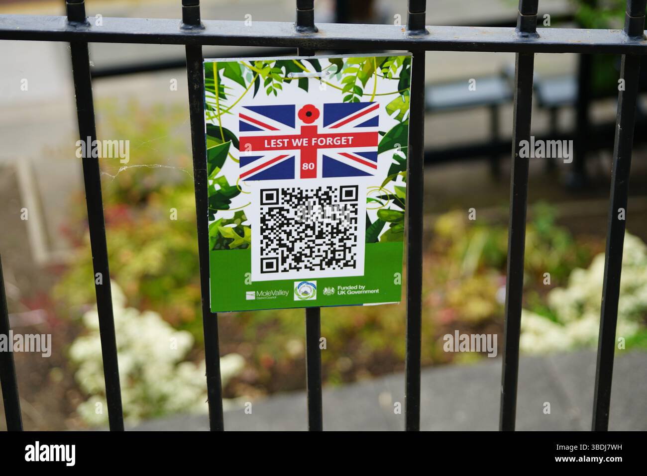 Commemorative Poster With QR Code on Railing in Urban Setting. Dorking ...