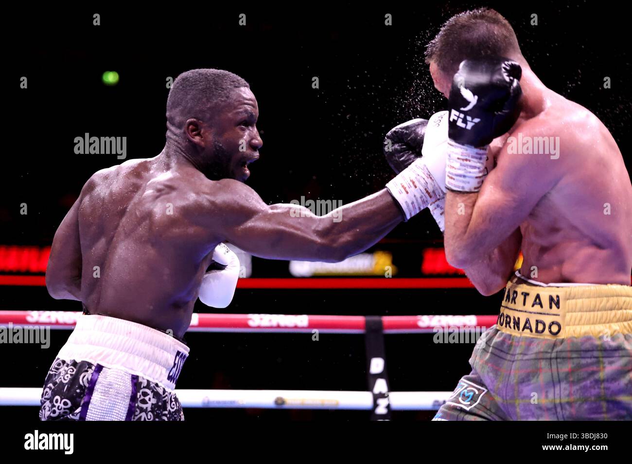 Ekow Essuman (left) in action against Josh Taylor in the WBO Global ...