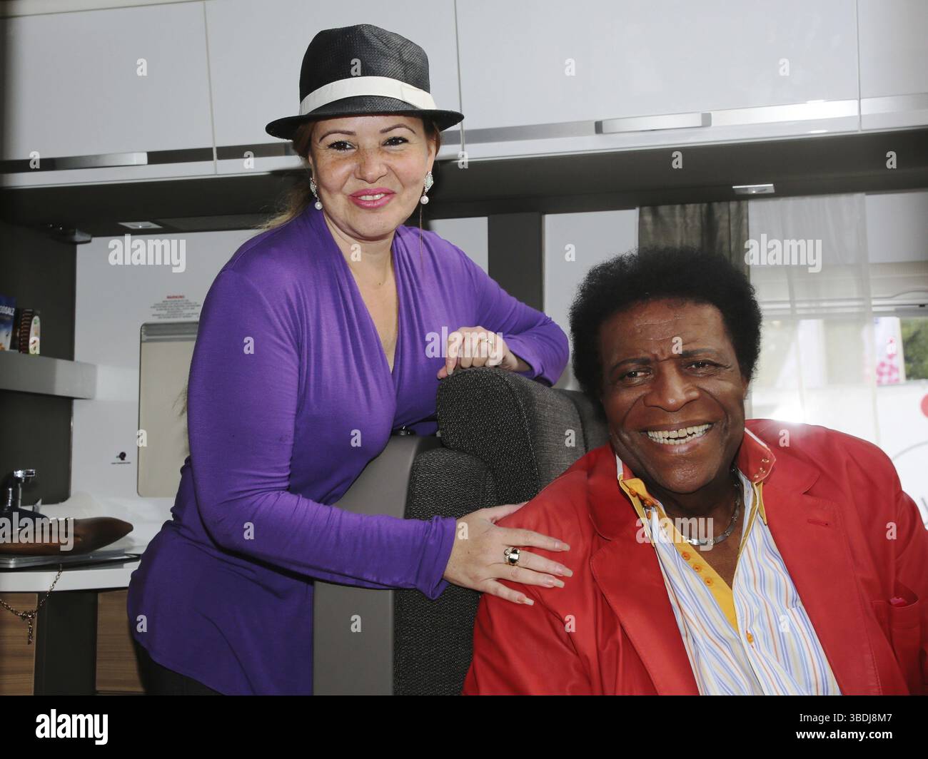 German pop singer Roberto Blanco with his woman Luzandra in his caravan ...