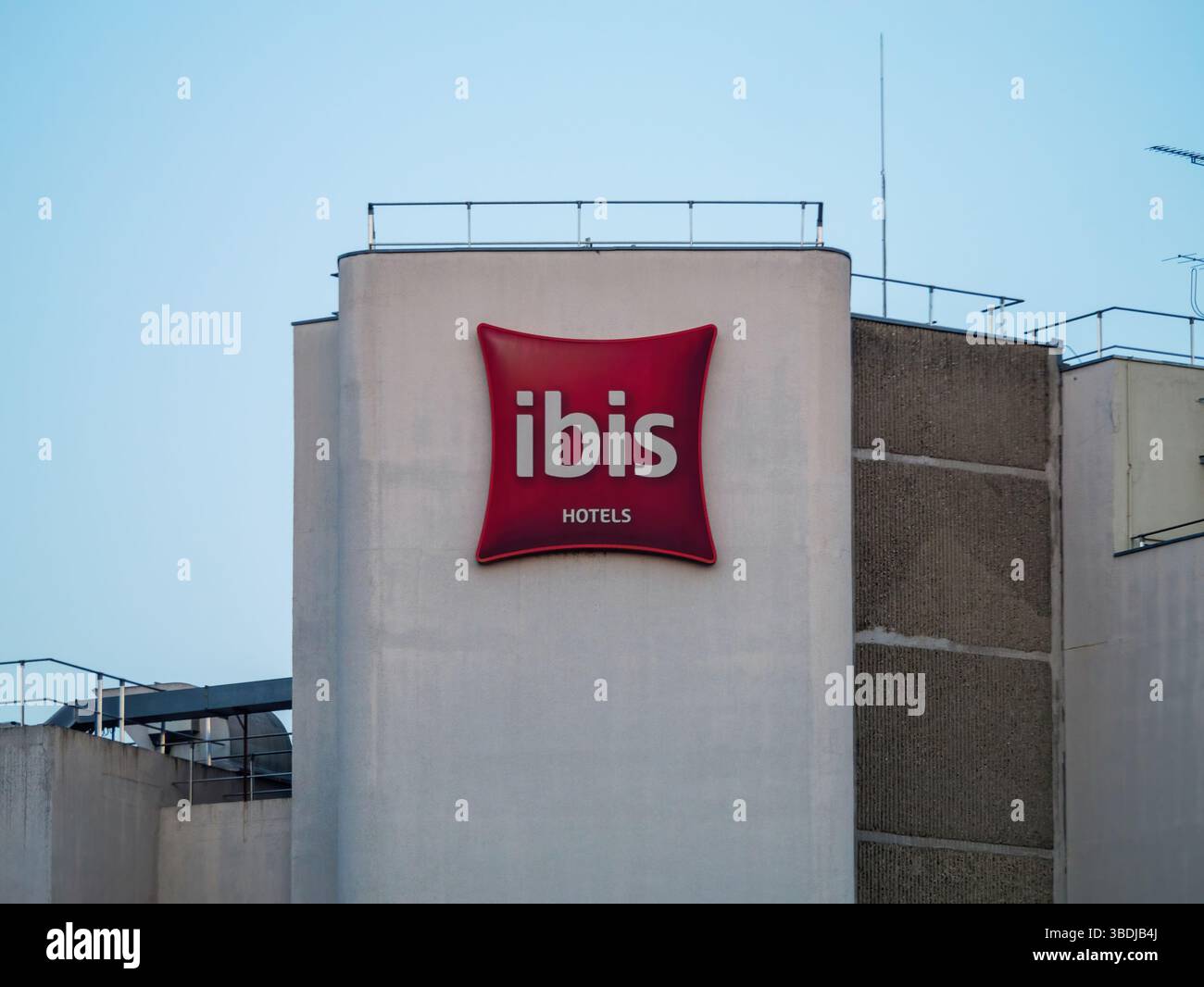 Paris, France - Aug 18, 2025: Red ibis hotel logo sign mounted on a ...