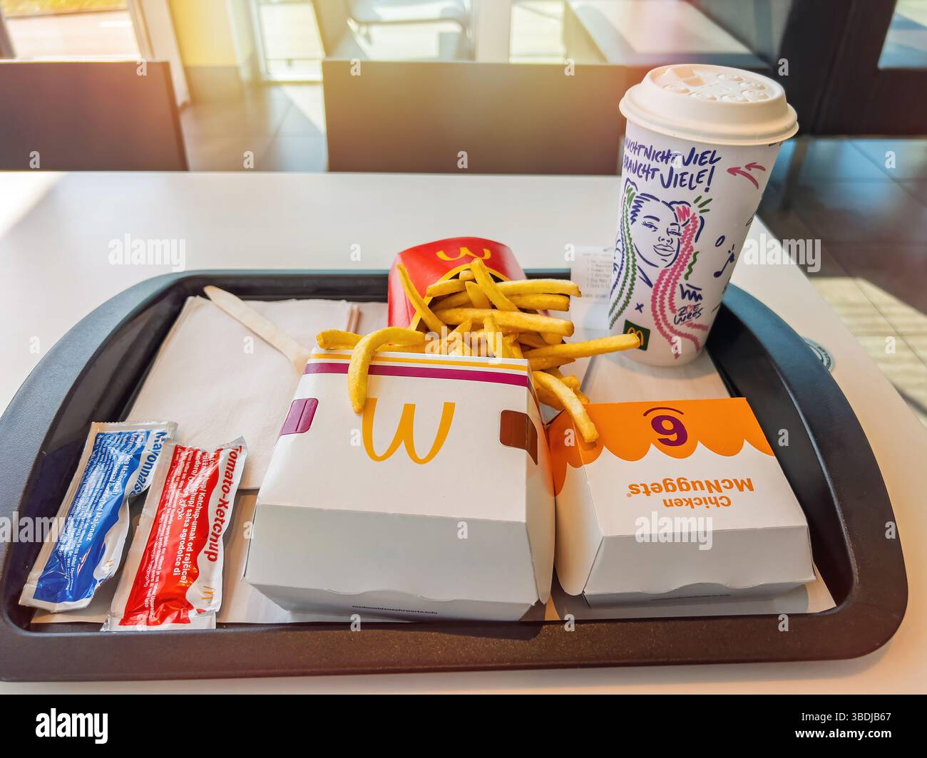 Berlin, Germany - Sept 14, 2023: A McDonald tray holding a burger ...