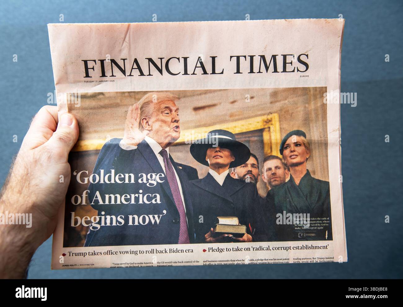 Paris, France - Mar 10, 2025: A hand holds the Financial Times ...
