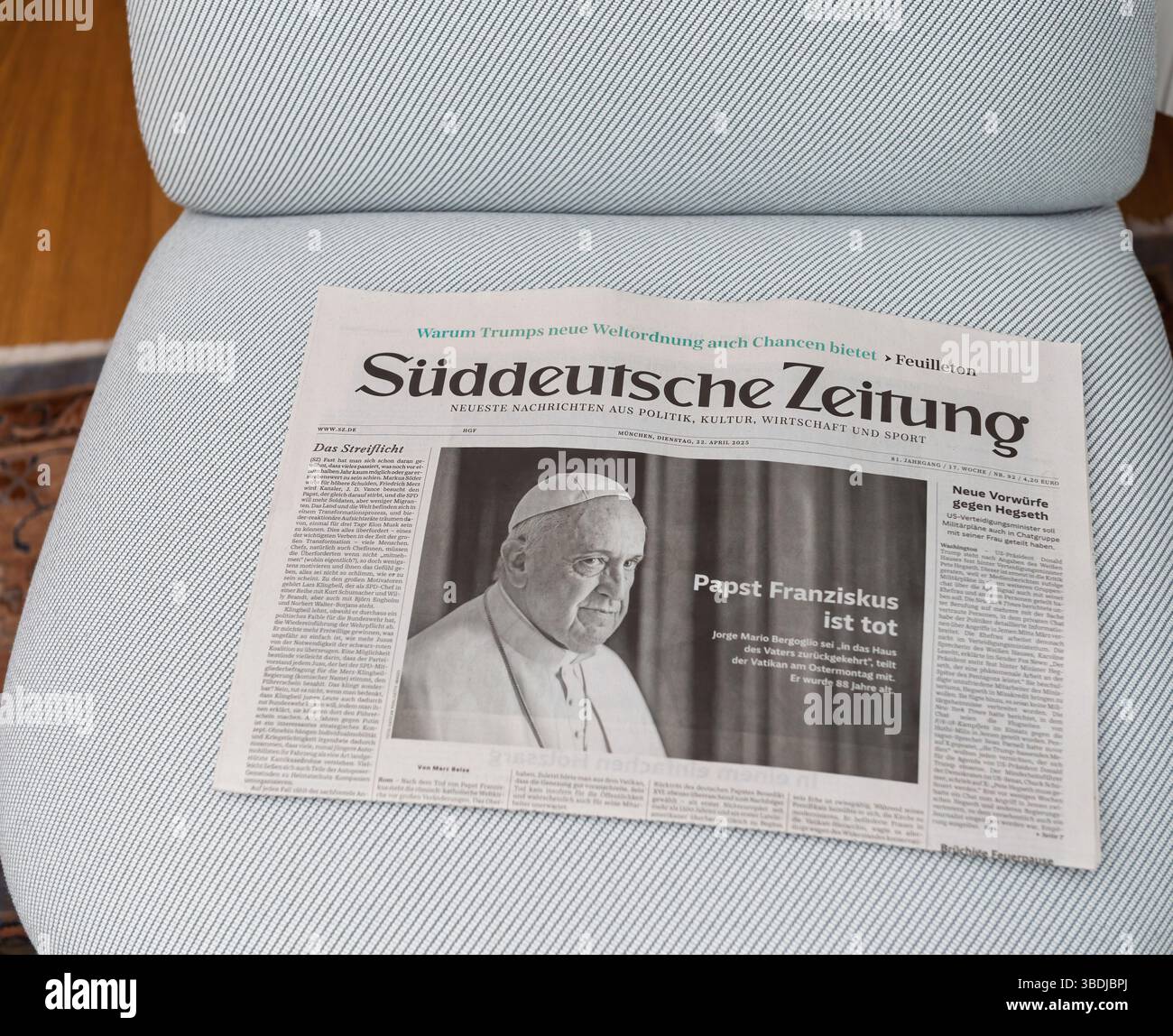 Paris, France - Apr 22, 2025: German newspaper on a cushioned chair ...