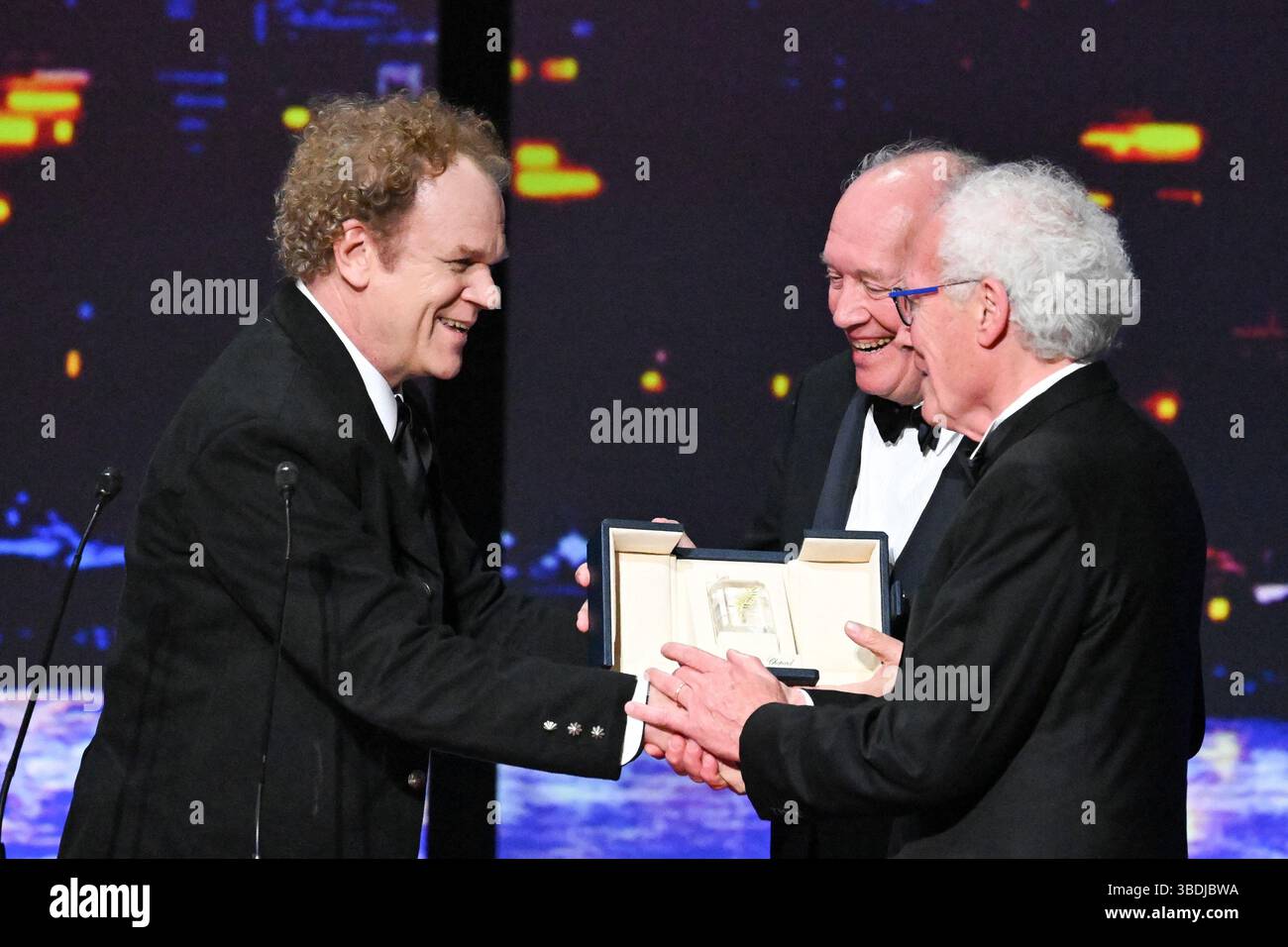 John C. Reilly, Jean Pierre Dardenne, Luc Dardenne attending the ...