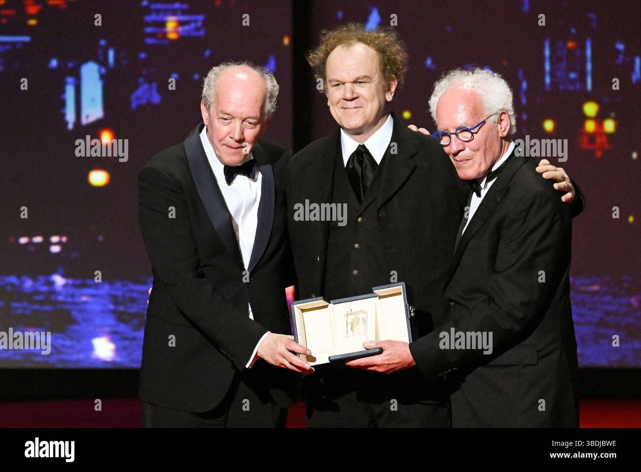 John C. Reilly, Jean Pierre Dardenne, Luc Dardenne attending the ...