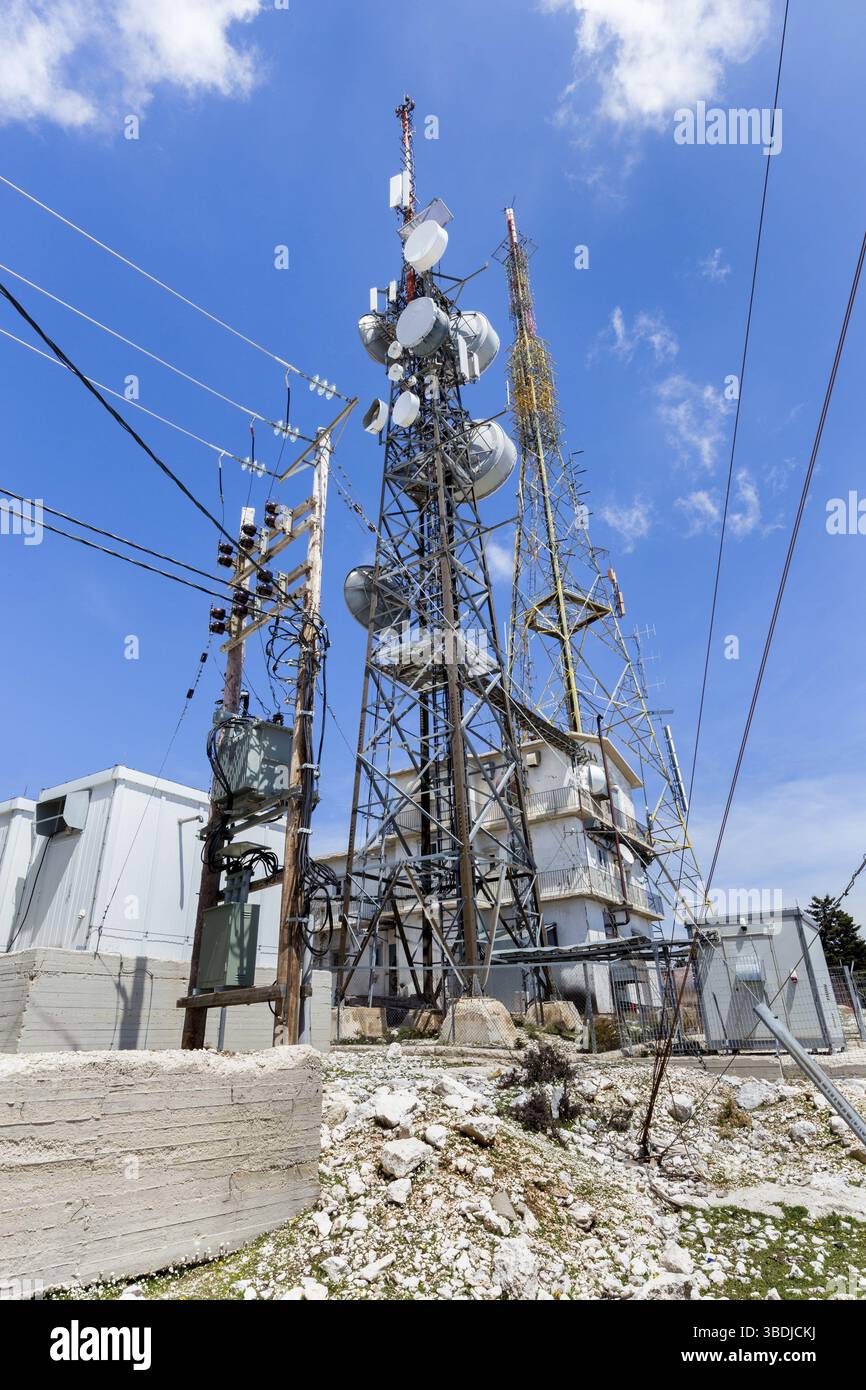 Transmission tower to transmit phone radio tv signals in Greece Stock ...
