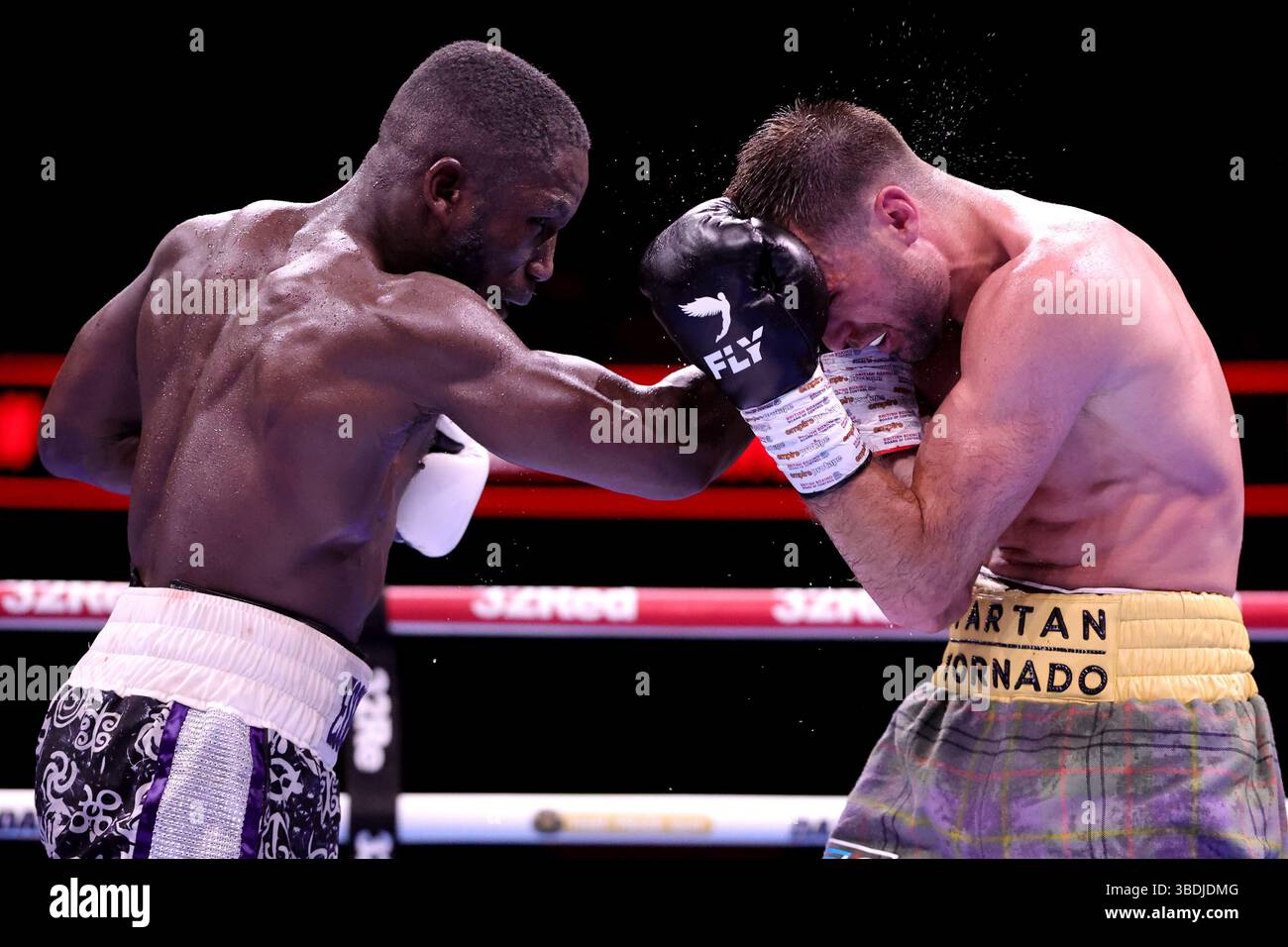 Ekow Essuman (left) in action against Josh Taylor in the WBO Global Welterweight bout at the OVO ...