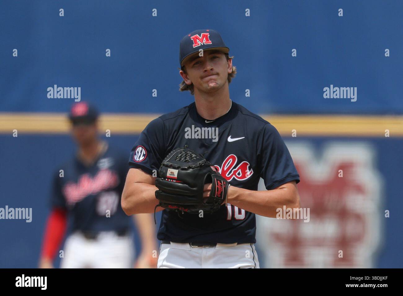 HOOVER, AL - MAY 24: Ole Miss pitcher Cade Townsend (10) grimaces after ...