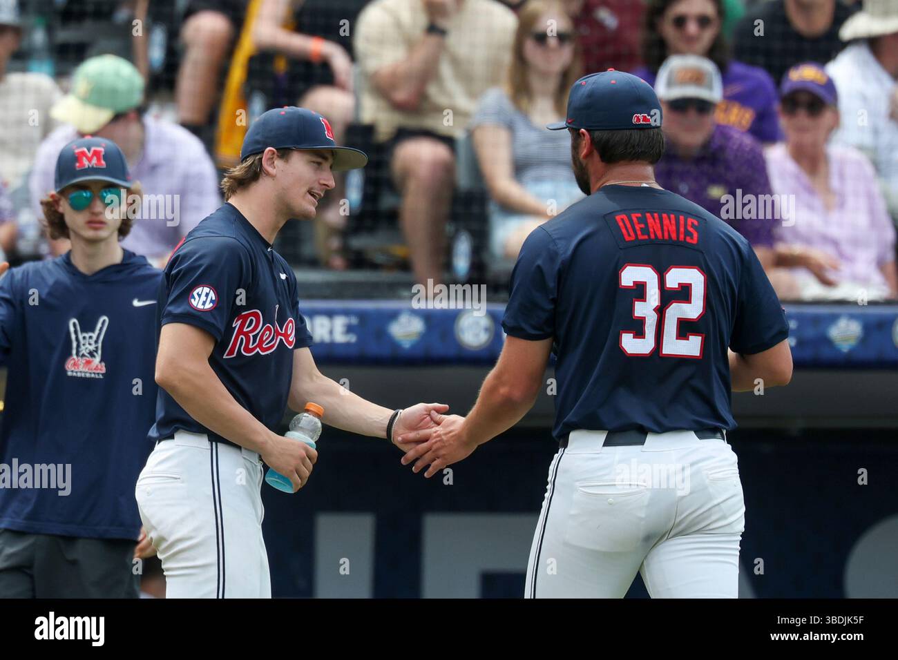 HOOVER, AL - MAY 24: Ole Miss pitcher Cade Townsend (10) high fives Ole ...