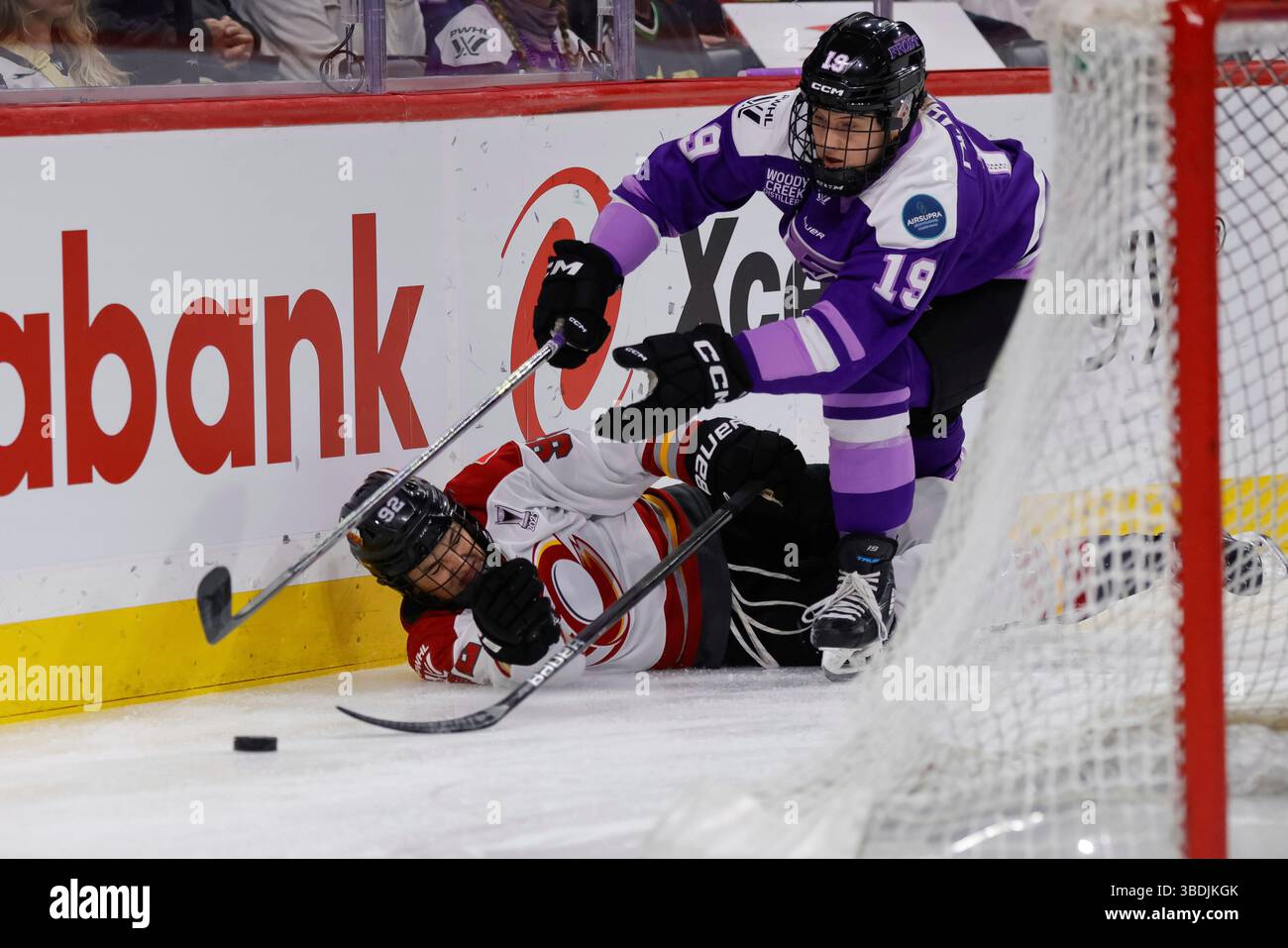 Minnesota Frost defenseman Maggie Flaherty (19) takes the puck away ...