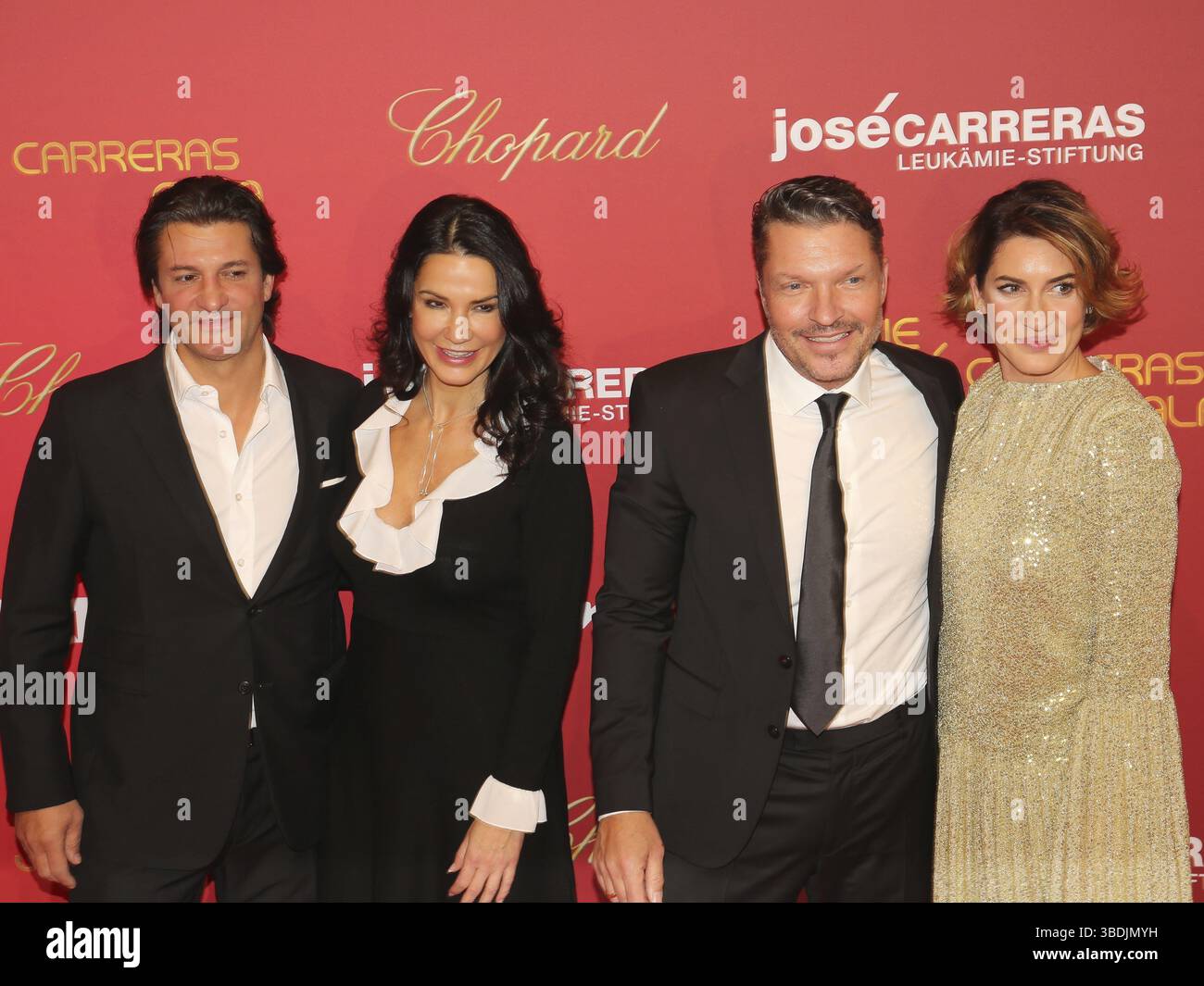 Michael Raumann with girlfriend Mariella Ahrens and actor Hardy Krueger ...