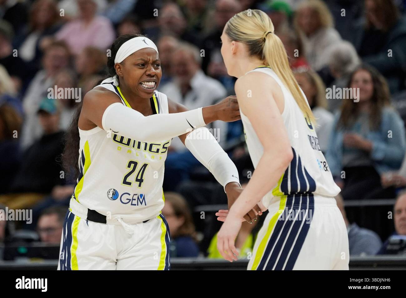 Dallas Wings guard Arike Ogunbowale (24) and guard Paige Bueckers (5 ...