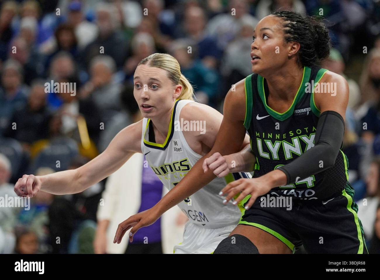 Dallas Wings guard Paige Bueckers (5) and Minnesota Lynx forward ...