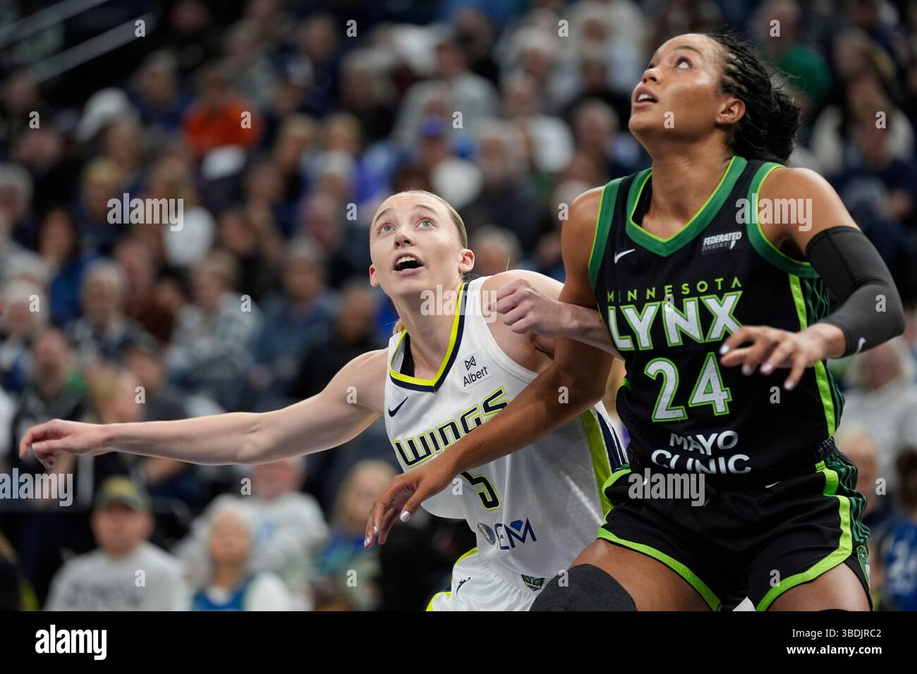 Dallas Wings guard Paige Bueckers (5) and Minnesota Lynx forward ...