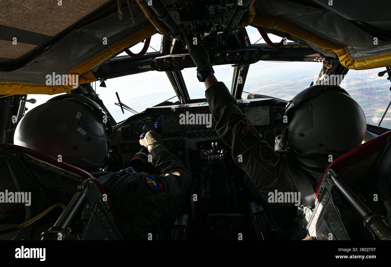 U.S. Air Force Capt. Jason Myers, left, and Maj. Noah Spitler, right ...