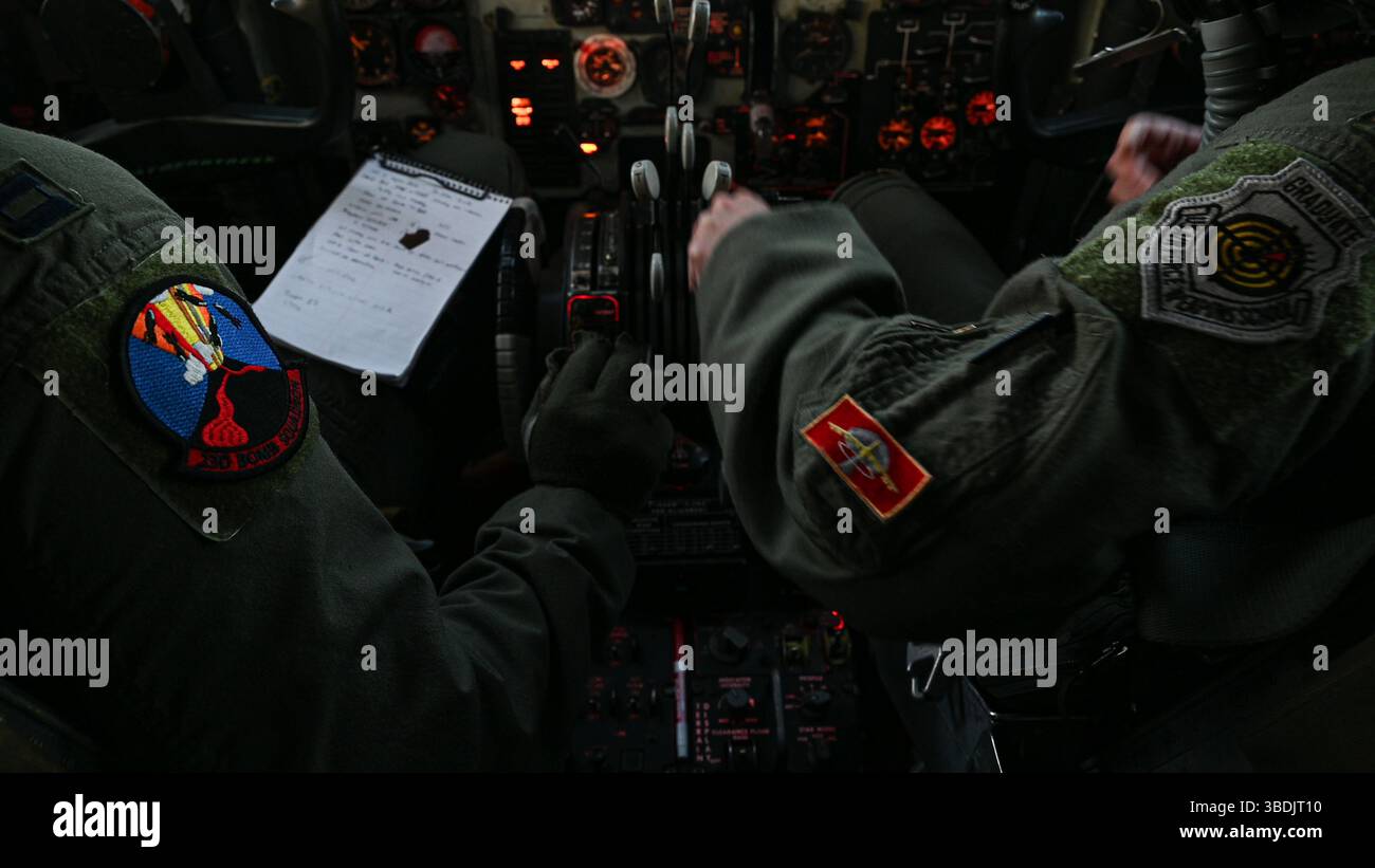 U.S. Air Force Capt. Jason Myers, left, and Maj. Noah Spitler, right ...