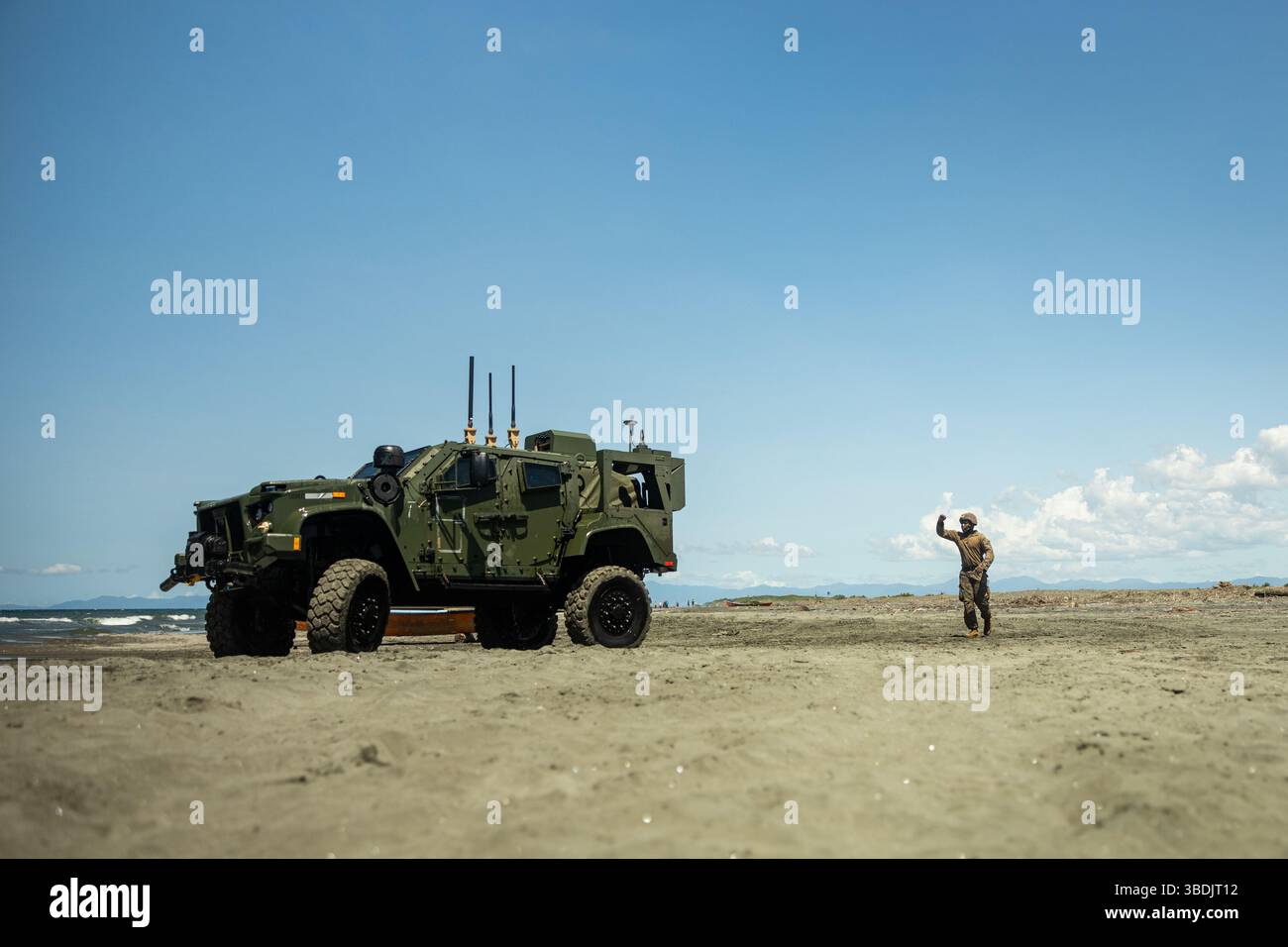 A U.S. Marine with 3d Littoral Combat Team, 3d Marine Littoral Regiment ...