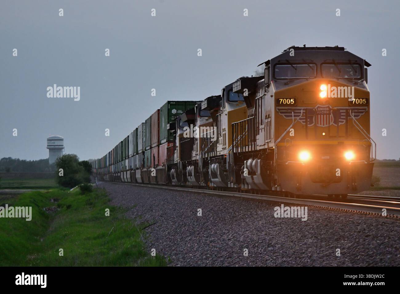 Maple Park, Illinois, USA. An eastbound Union Pacific Railroad stack train races toward Chicago ...