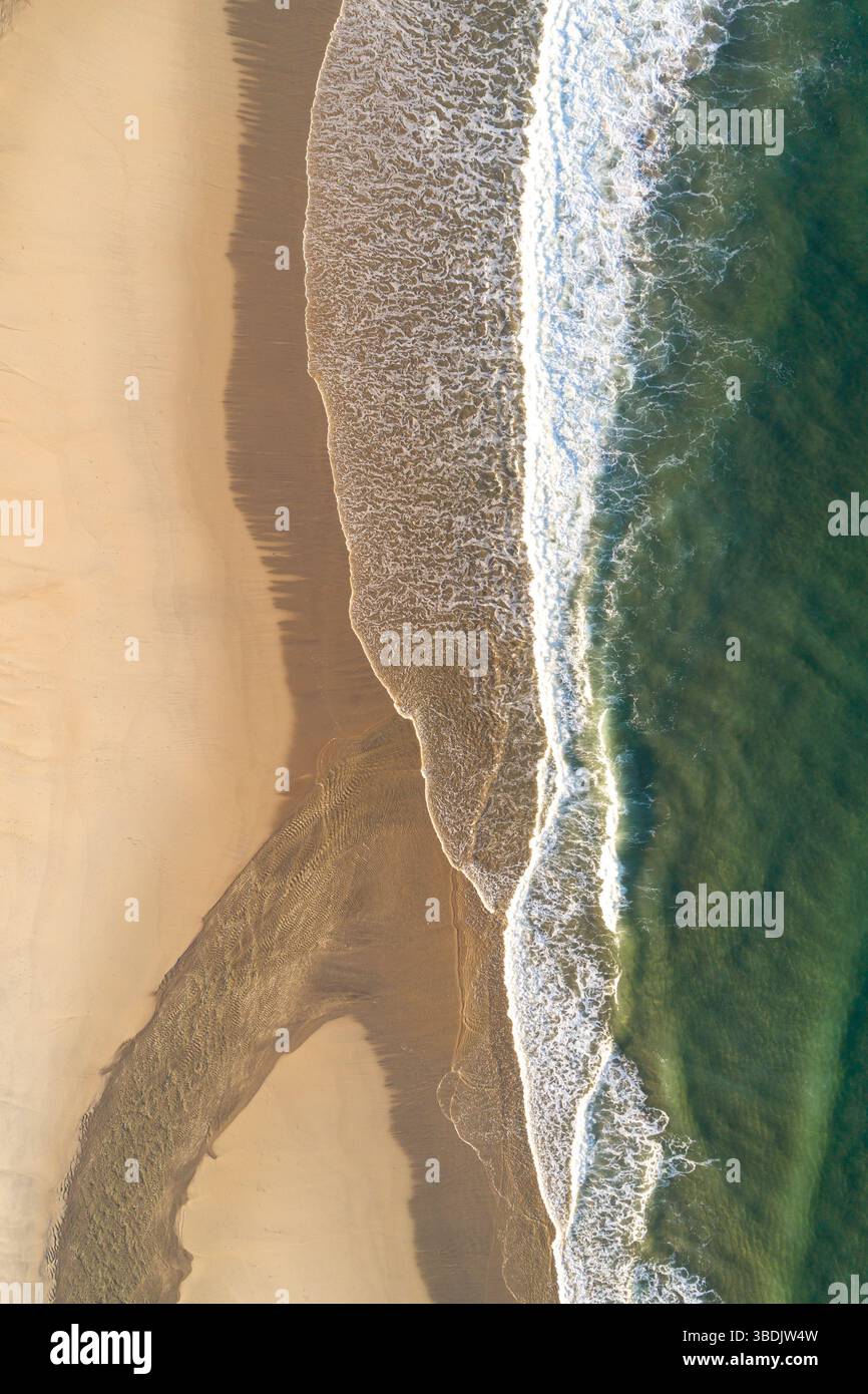 aerial view of natural sand patterns and textures by water Stock Photo ...