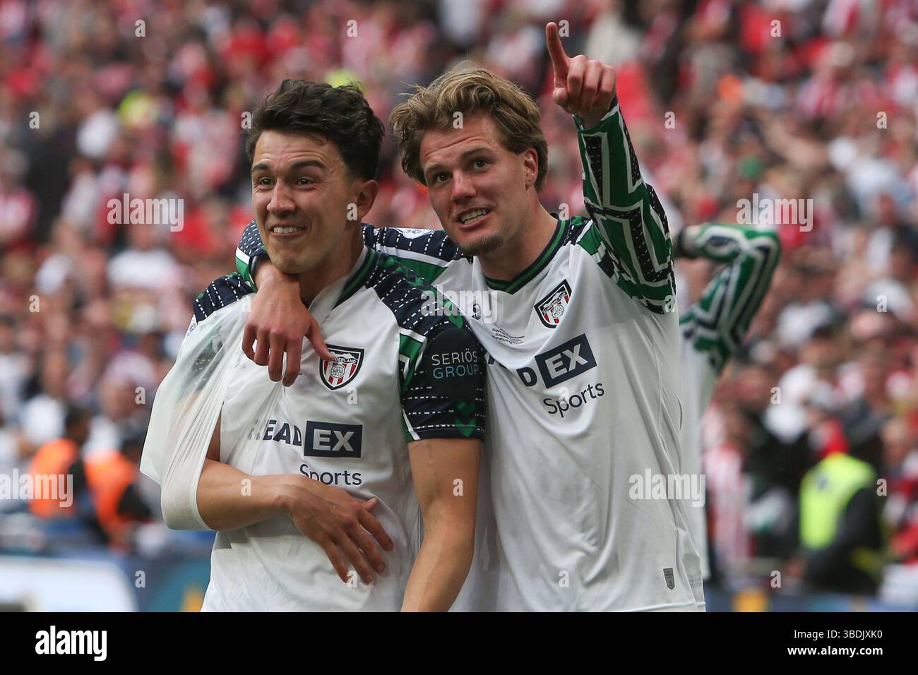 Sunderland's Luke O'Nien and Sunderland's Leo Hjelde celebrate during ...