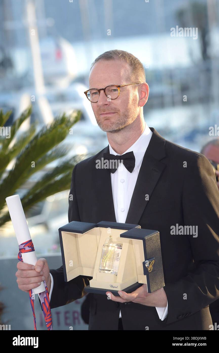 Cannes, France. 24th May, 2025. CANNES, FRANCE - MAY 24: Joachim Trier pose with the Grand Prix ...