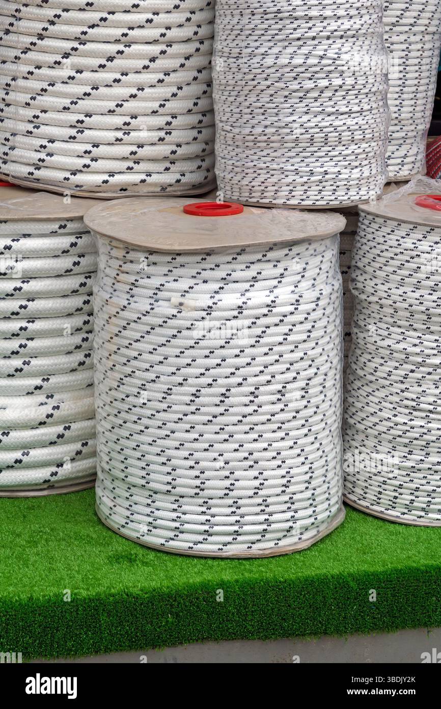 Strong nylon nautical marine rope rolled up in a cord Stock Photo - Alamy
