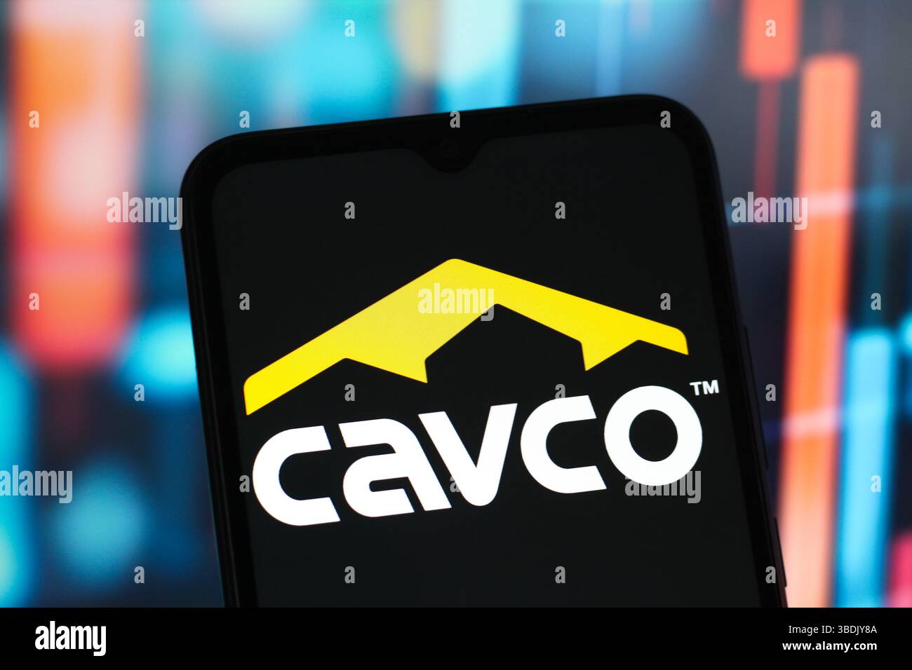 In this photo illustration, the Cavco Industries logo is seen displayed ...
