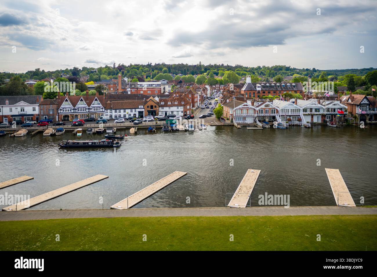 Panoramic, elevated view of a historic English riverside town, with a ...