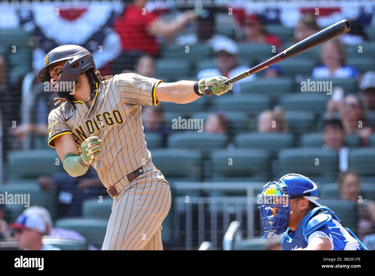San Diego Padres' Fernando Tatis Jr. swings at a pitch in the first ...
