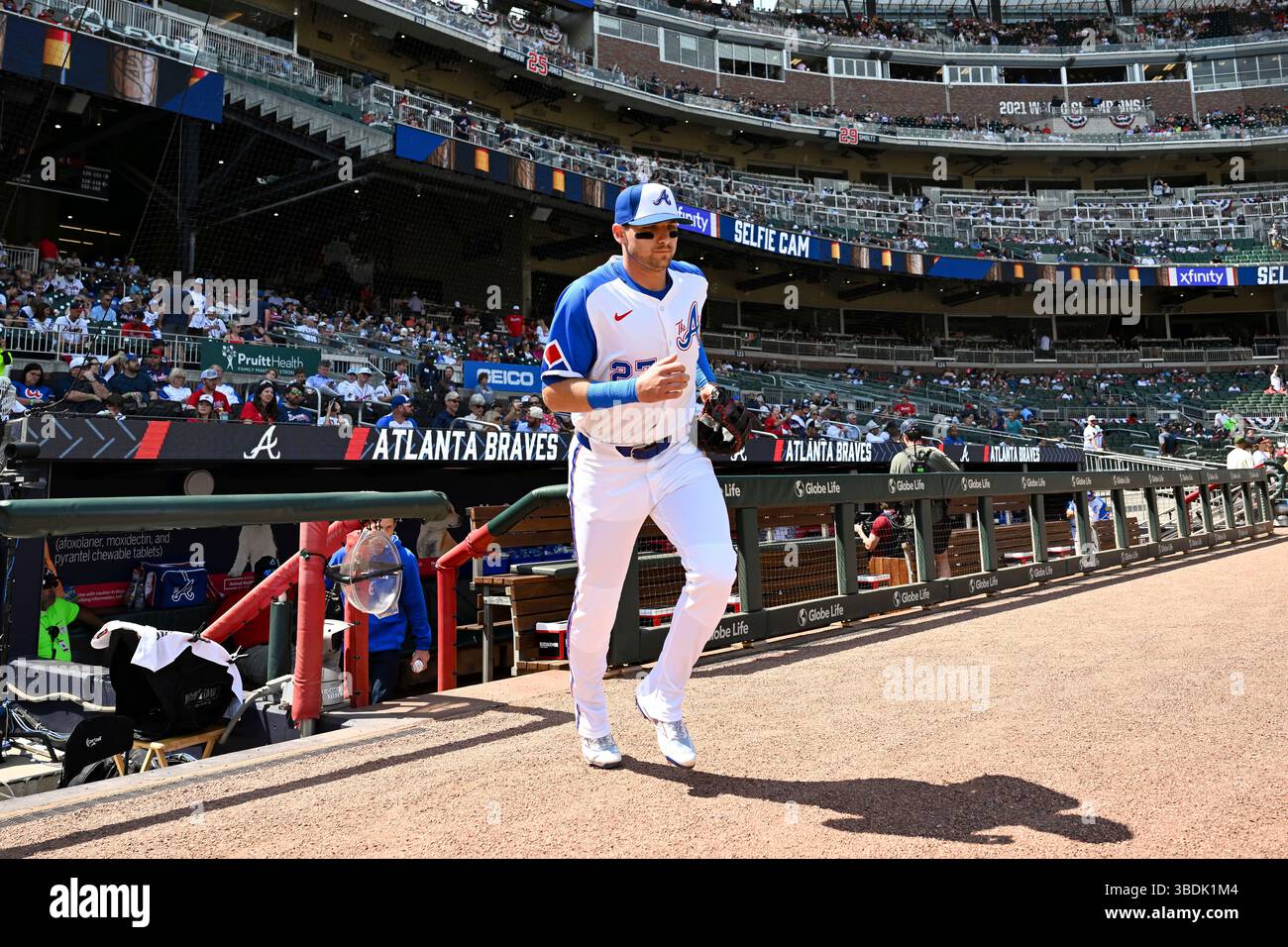 ATLANTA, GA – MAY 24: Atlanta third baseman Austin Riley (27) runs onto ...