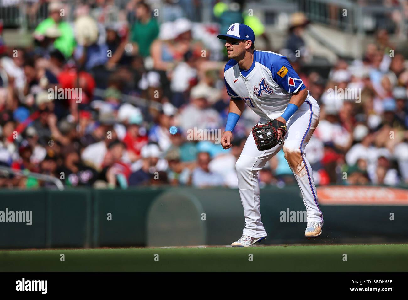 Atlanta Braves third baseman Austin Riley gears up for a pitch in the ...