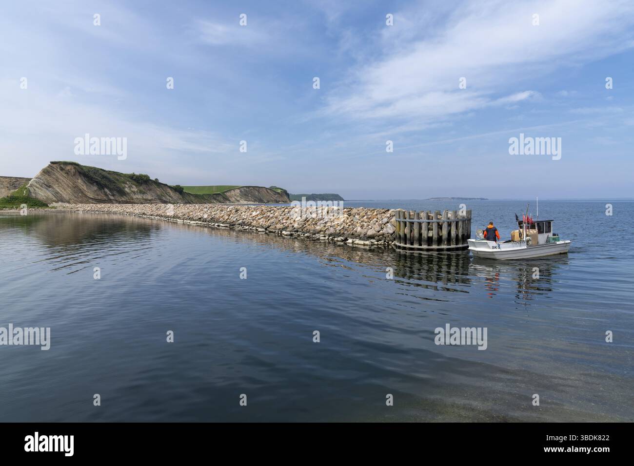 Ejerslev Lyng, Denmark - 1 June, 2021: small fishing boat enters the ...