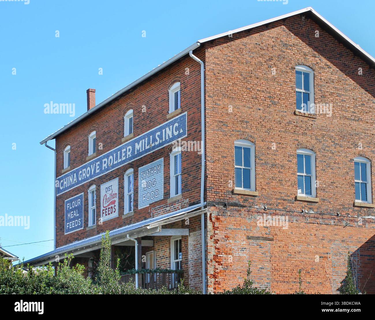 Three story red brick store in China Grove, North Carolina Stock Photo ...